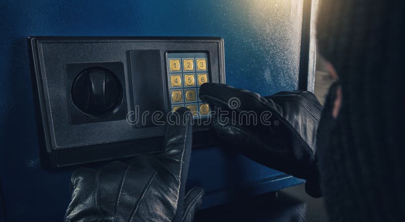 Burglar Enter a Code To Crack a Safe Stock Image - Image of gangster ...