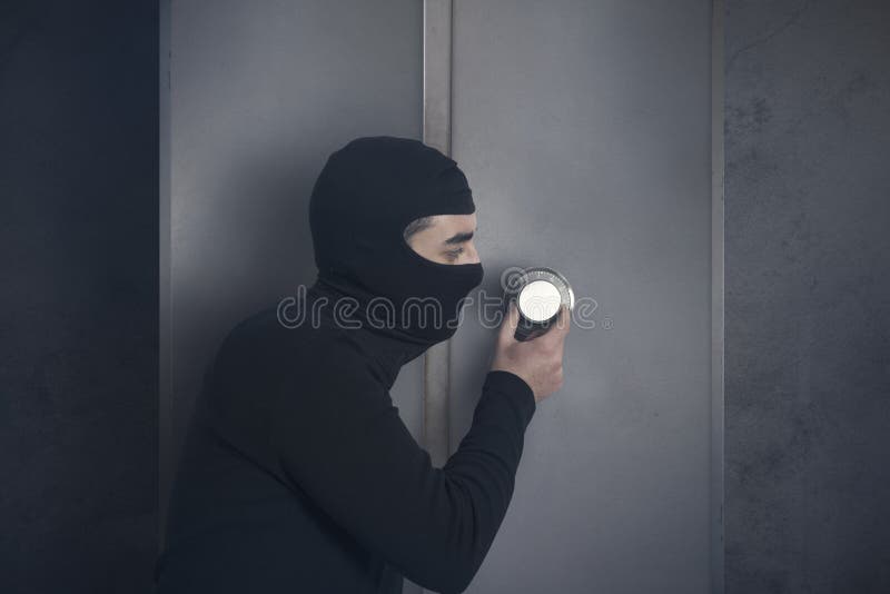 Burglar Breaking in To Home at Night through Back Stock Photo - Image ...