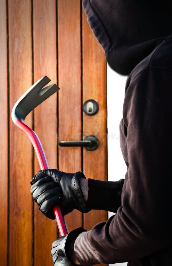 Burglar with a crowbar stock image. Image of security - 36591917