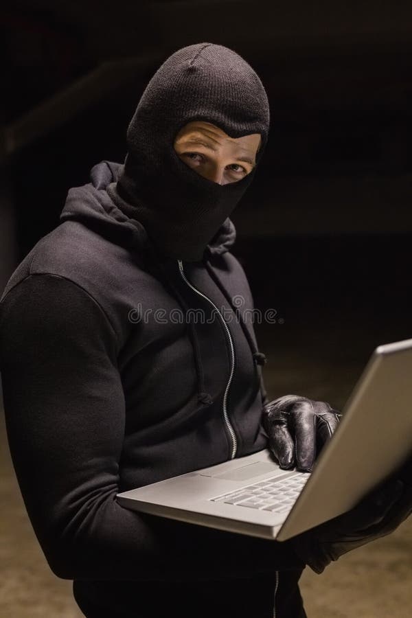 Burglar Looking at the Laptop Behind Woman Stock Image - Image of away ...