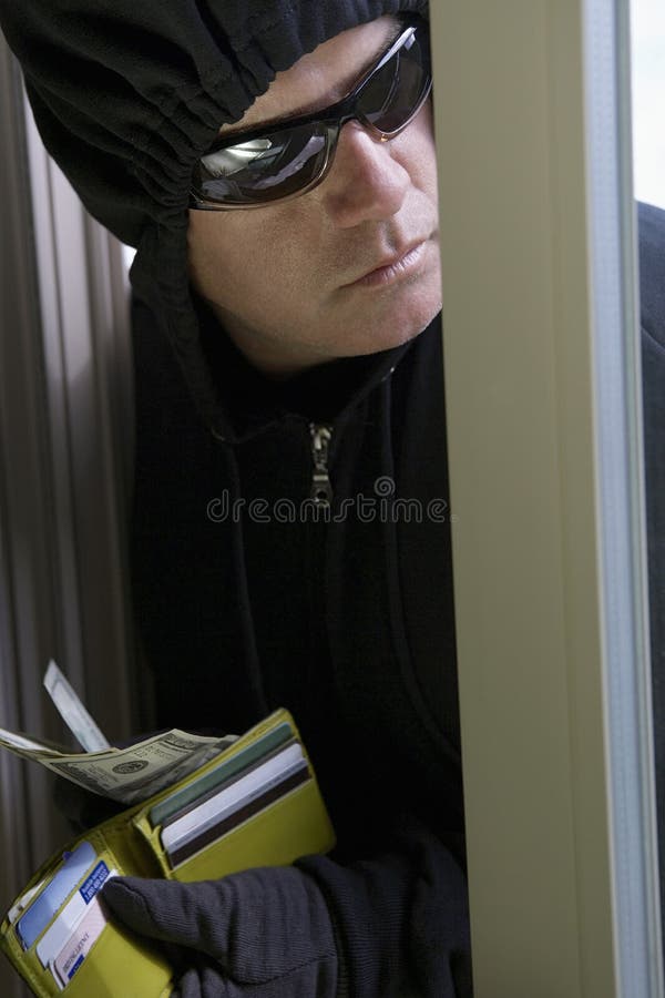 Burglar Stealing Money stock photo. Image of money, robber - 29659732