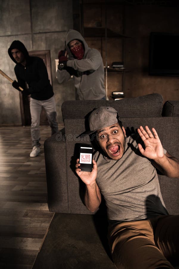 Burglars and scared man stock image. Image of crime, money - 93100437