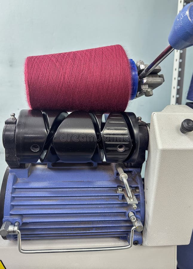 Burgundy Yarn on a Winding Machine during the Production Process Stock ...