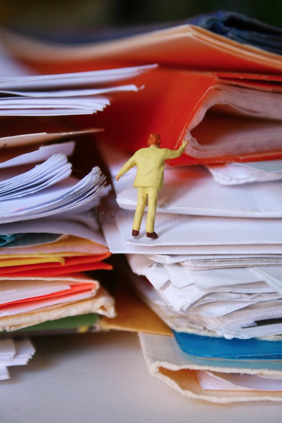 Buried under paper work stock photo. Image of literate - 1758856