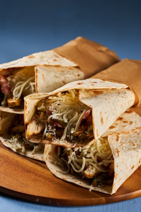 Burito roll wraps on blue stock photo. Image of kebab - 266099442