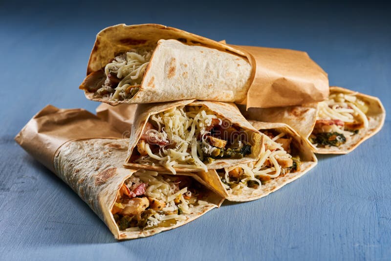 Burito roll wraps on blue stock photo. Image of healthy - 266099448