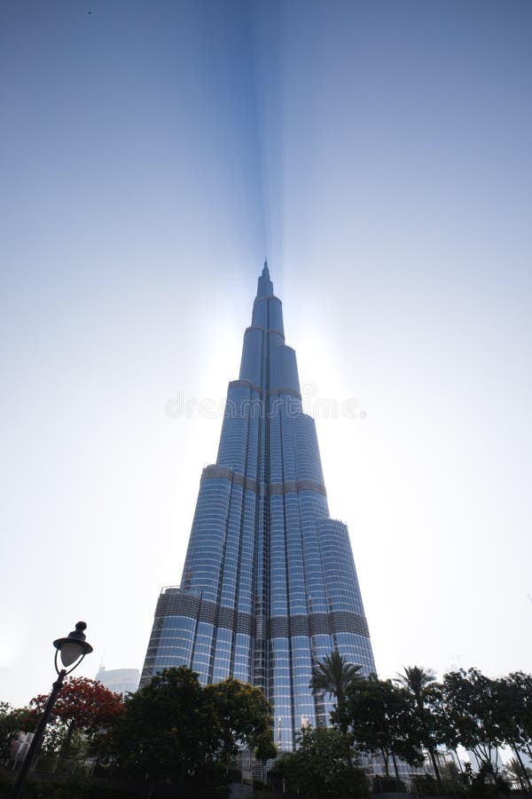Burj Khalifa Casting a Shadow through Clouds during a Sunrise ...