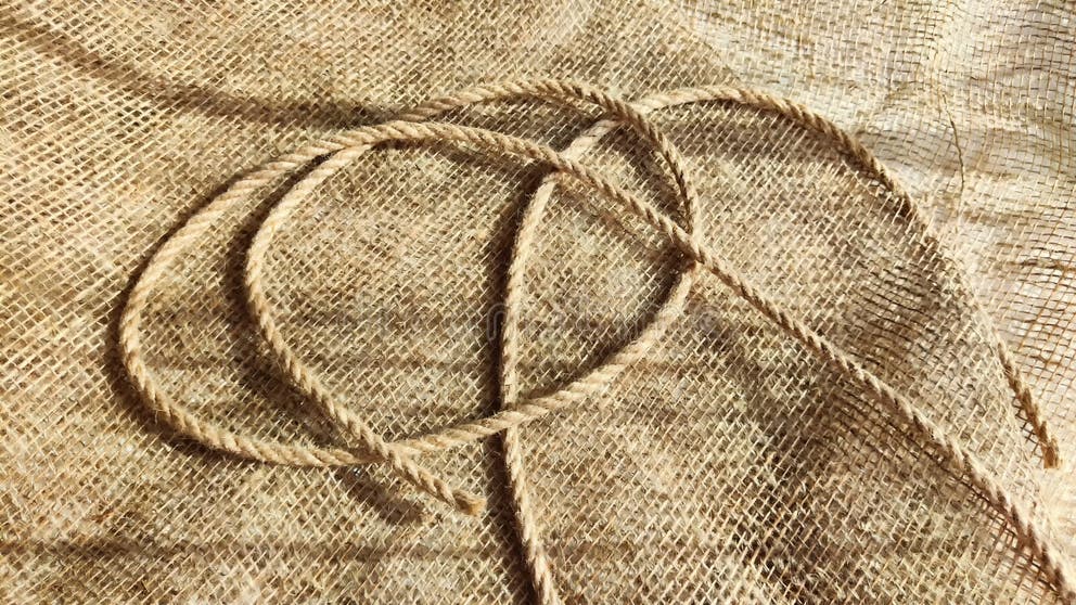 Burlap Fabric, Coarse Jute Weave, and Thick Burlap Rope. Background ...