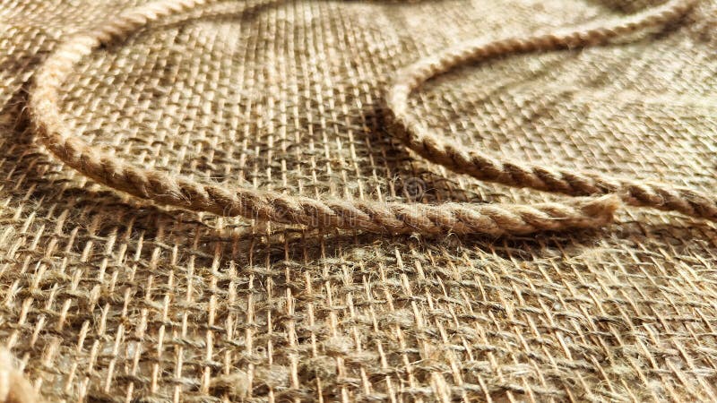 Burlap Fabric, Coarse Jute Weave, and Thick Burlap Rope. Background ...