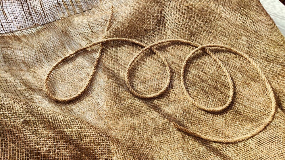 Burlap Fabric, Coarse Jute Weave, and Thick Burlap Rope. Background ...