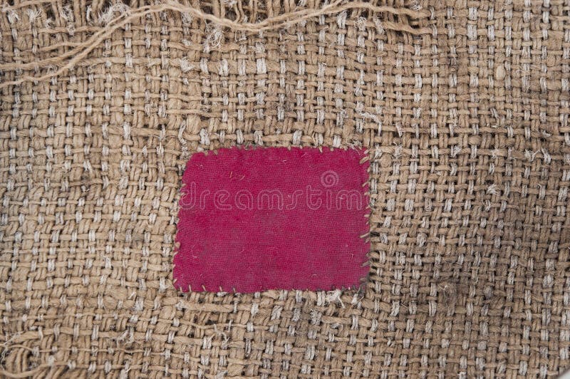 Burlap with red patch stock photo. Image of rope, closeup - 84860968