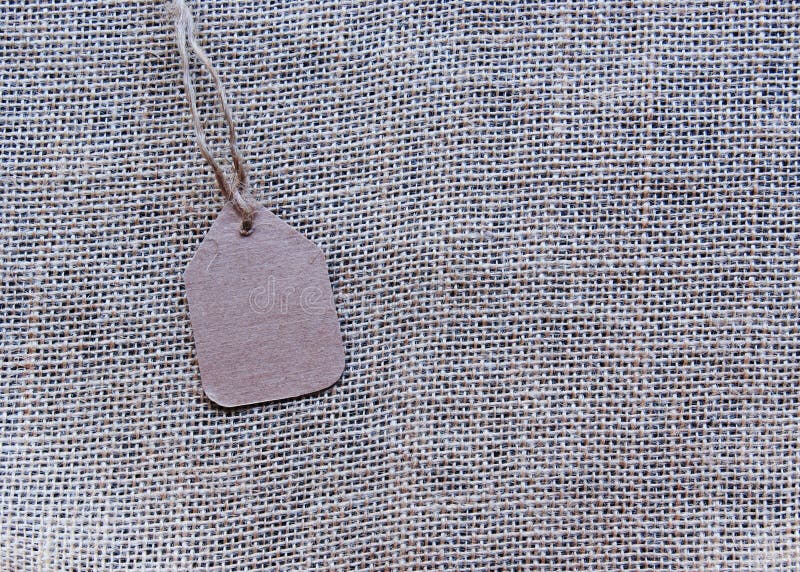 Burlap Textured Surface with a Price Tag Stock Photo - Image of ...