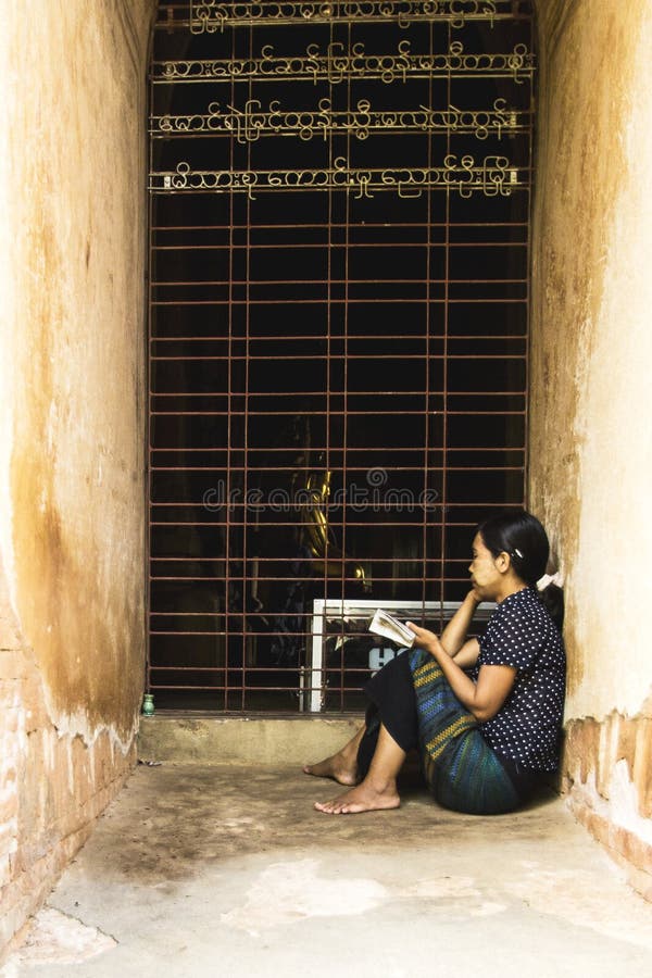 Reading burmese book stock photo. Image of printed, local - 30091020