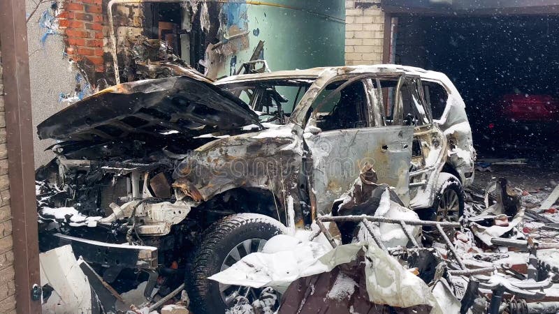 A Burned Car after a Missile Strike in the Courtyard of a Residential ...