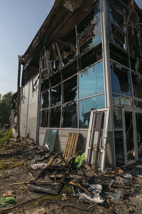 Burned Construction with Broken Windows in Summer Stock Image - Image ...