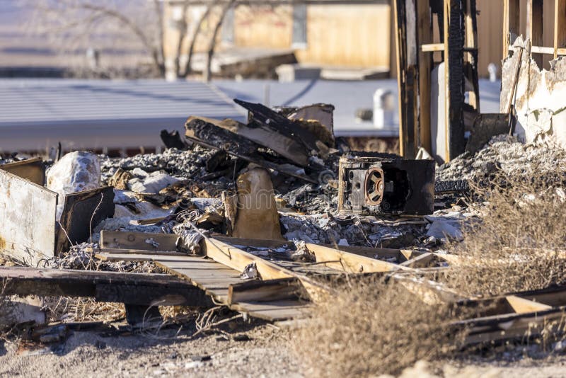 Burned Items Scattered on the Ground Left Over from a House Fire Stock ...