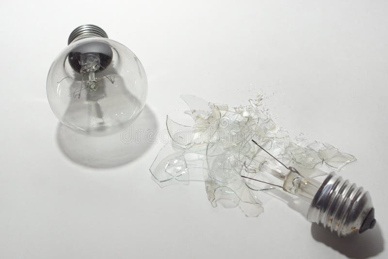 The Burned Out Bulb Next To the Shattered Light Bulb Stock Image ...