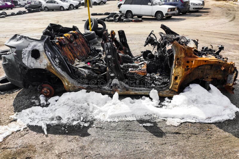 Burned-out Car after Arson Accident. Melted Plastic in a Fire. Stock ...