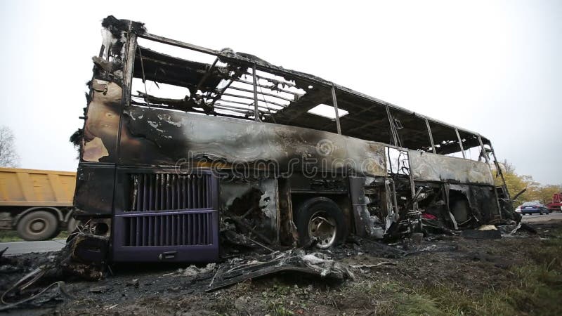 Burned-out Passenger Bus on the Side of the Road Stock Video - Video of ...
