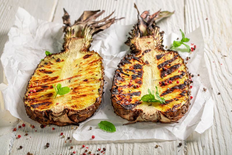 Burned Pineapple on Grill Grate with Fire Stock Image - Image of ripe ...