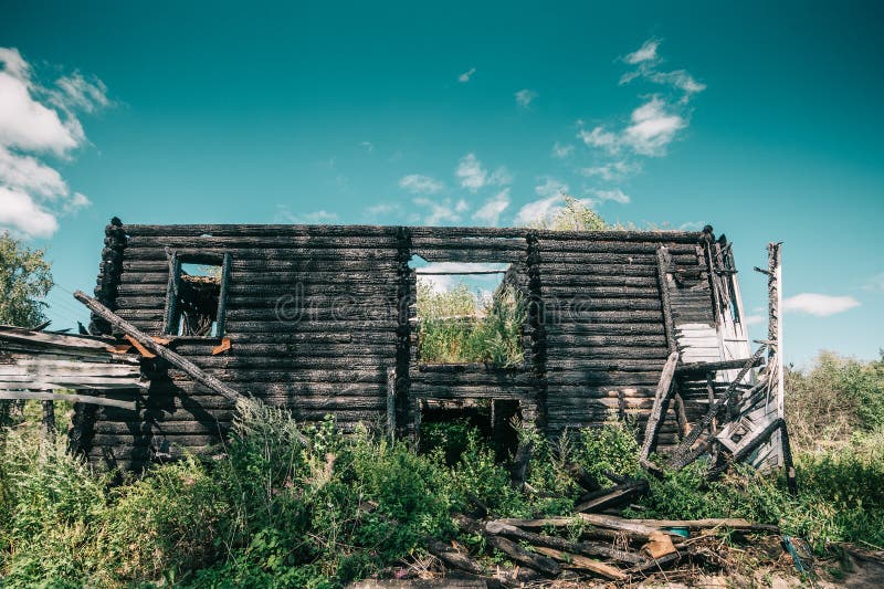 Burned Ruined House Facade Exterior, Black Wooden Walls in Ash after ... Burned Ruined House Facade Exterior, Black Wooden Walls in Ash after ...