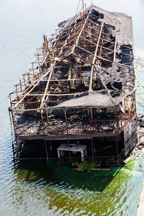 Burned ship in water stock image. Image of destroy, fire - 177893929