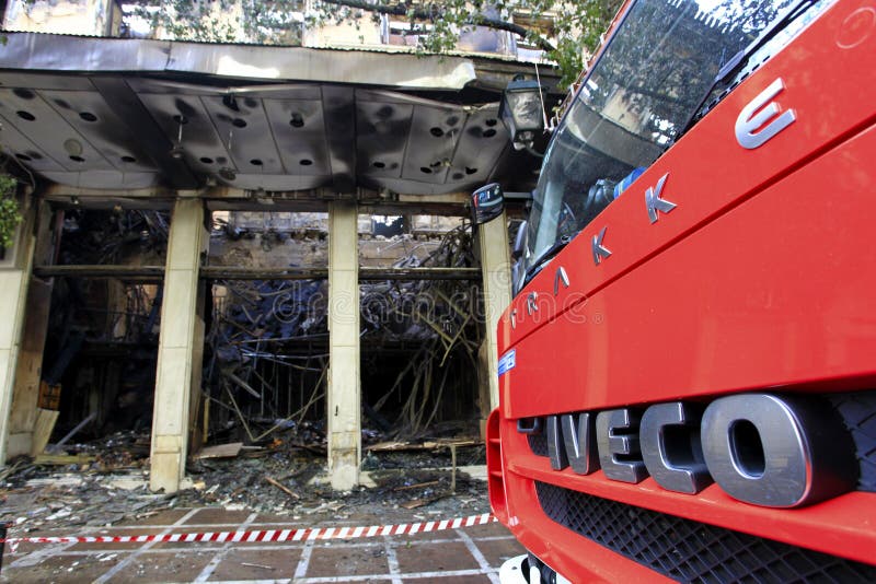 Burned Store with a Firefighters Truck Editorial Photo - Image of smoke ...