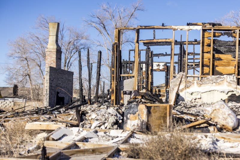 Burned Wood and a Brick Chimney Stand after Everything Else Has Fallen ...