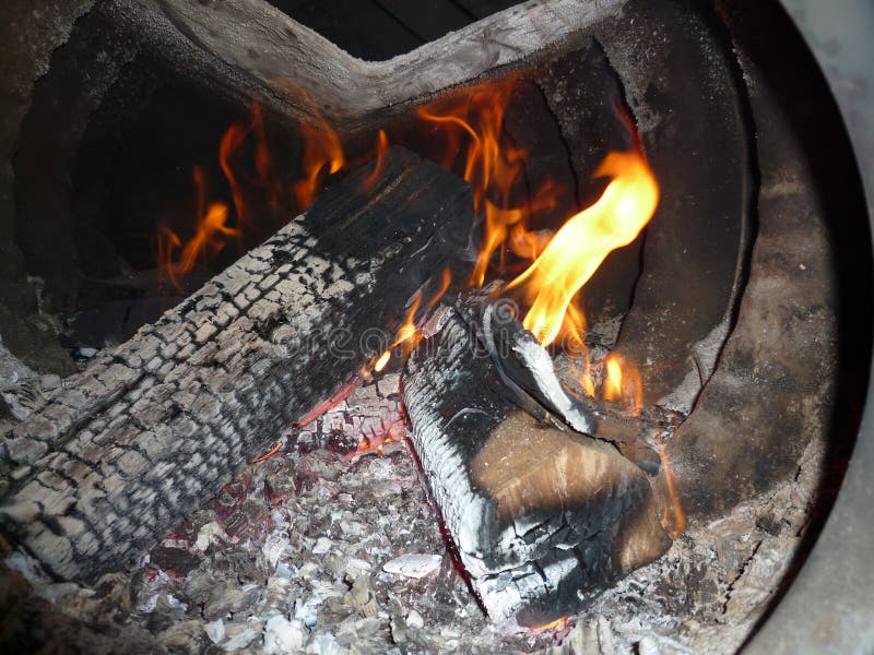 Burned wood in the oven stock image. Image of ovenfront - 172435371