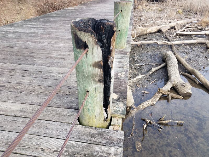 Burned Wood Post with Metal Struck by Lightning Stock Photo - Image of ...