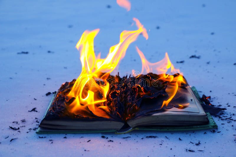 Burning Book in Snow. Pages with the Text in Open Book Burn with Bright ...