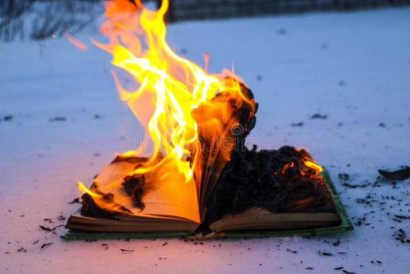 Book with Burning Pages on a Concrete Surface Stock Image - Image of ...