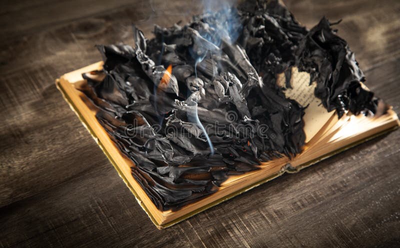 Burning Book on the Wooden Table Stock Photo - Image of heat, table ...