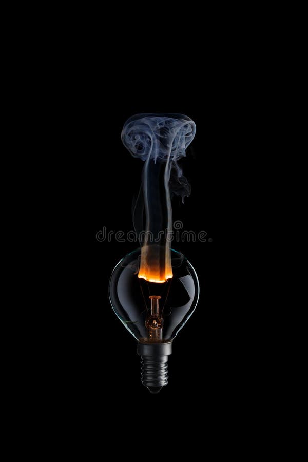 Burning broken light bulb stock photo. Image of creative - 182618568