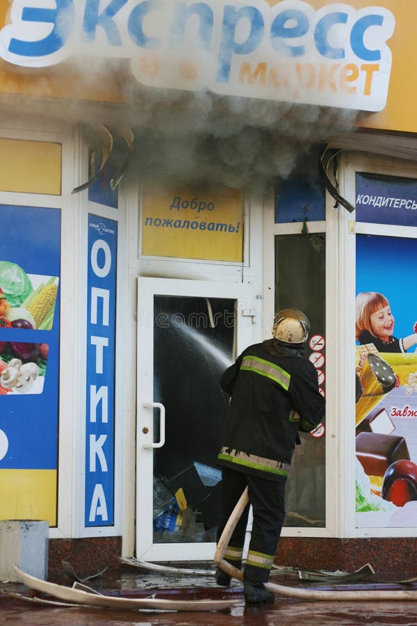 Burning Building in the City. Fire Extinguishing Operation Editorial ...