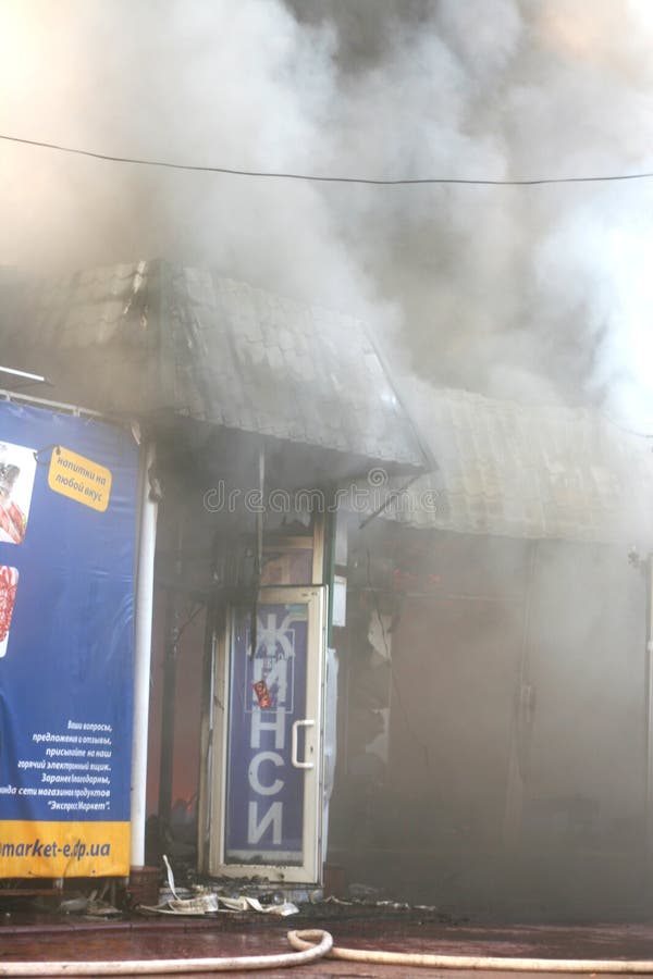 Burning Building in the City. Fire Extinguishing Operation Editorial ...