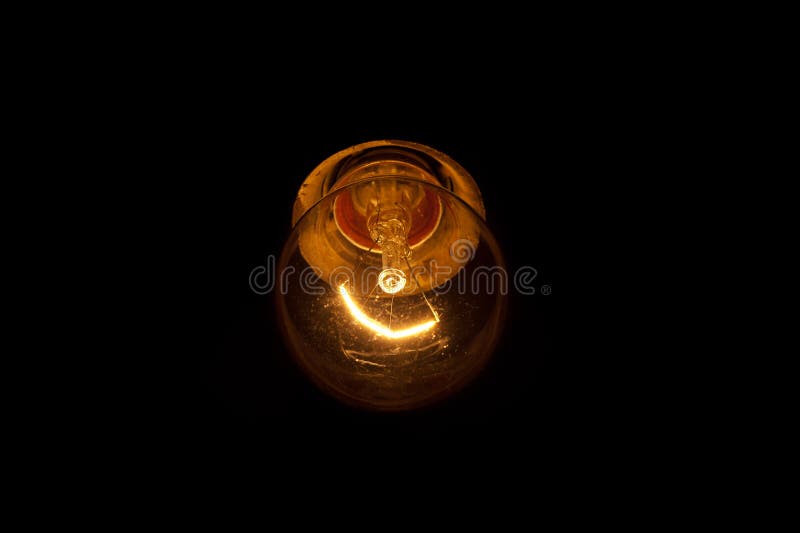 Burning bulb inside a box stock image. Image of science - 164022823