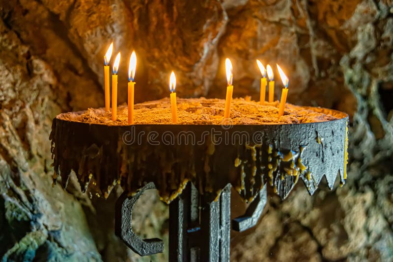 Burning Candle in the Cave. Candles Burning Inside Mysterious in Dark ...