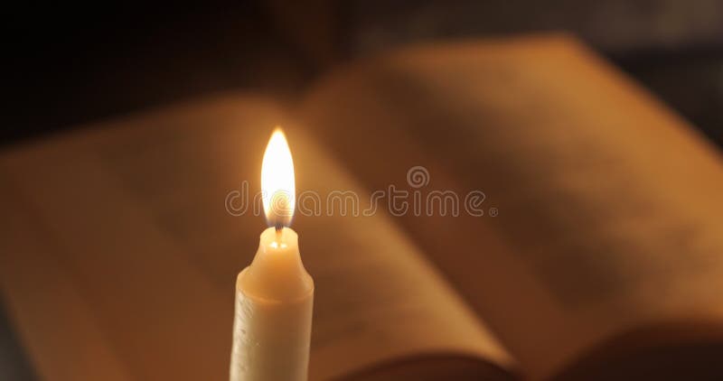 A Burning Candle and an Old Book Stock Image - Image of vintage, study ...