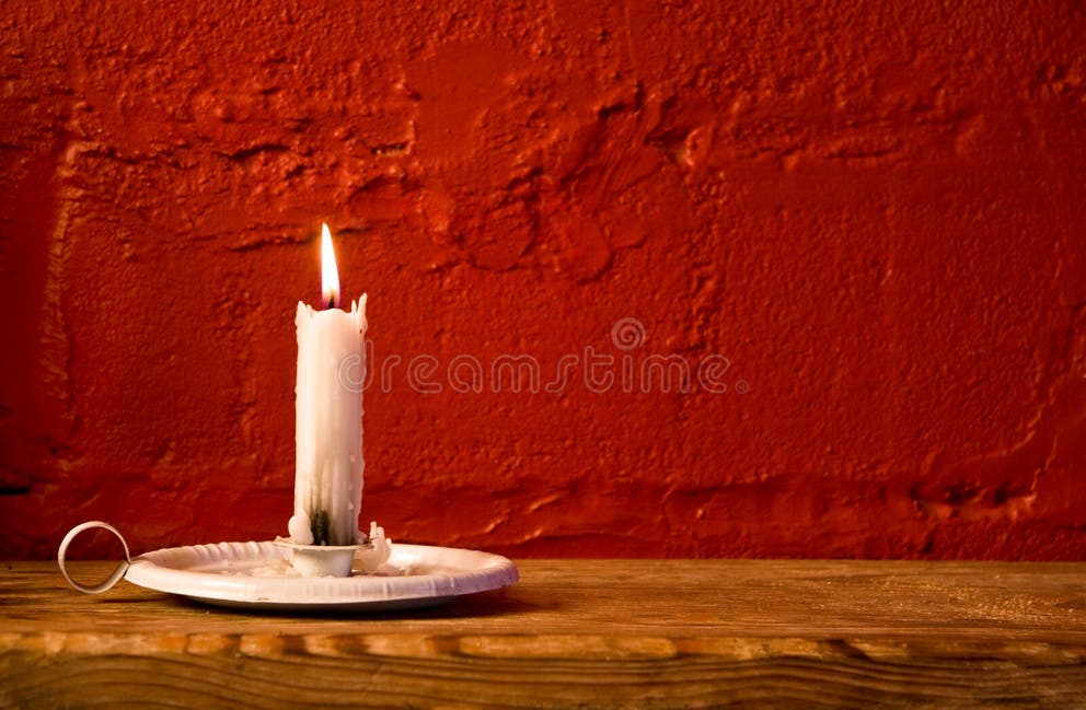 Burning candle red wall stock photo. Image of flame, burn - 10203604
