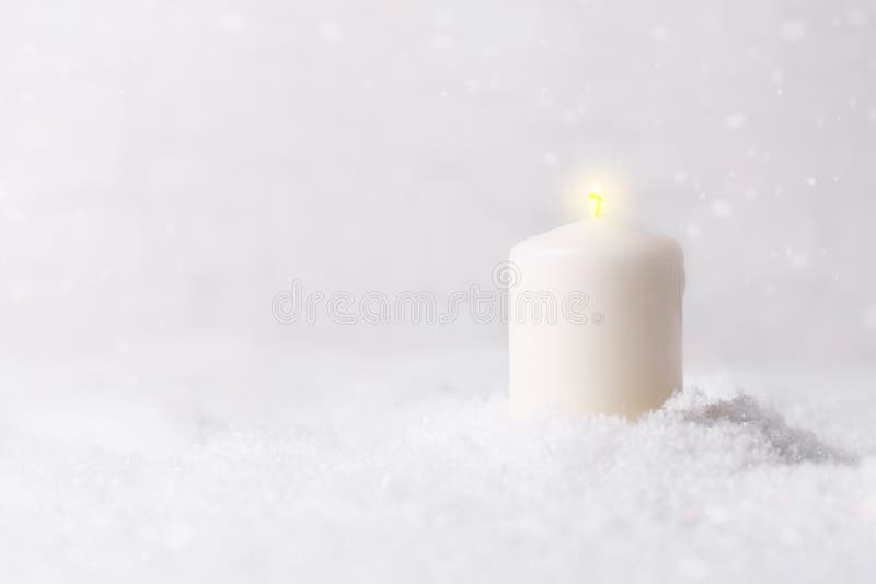 Burning candle in snow stock photo. Image of light, calm - 104780906