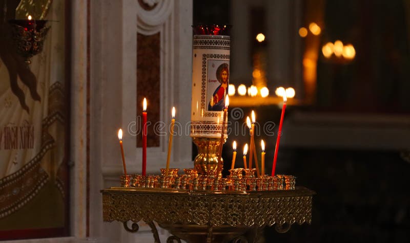 Burning Candles in the Church Editorial Photography - Image of ...