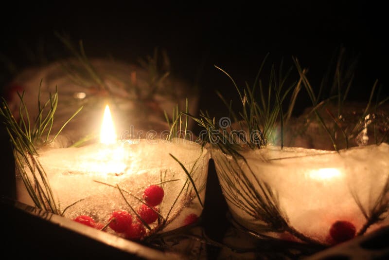 Burning Candles in an Ice Candlestick Stock Image - Image of scroll ...