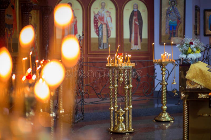 The Burning Candles for a Prayer in Orthodox Church Editorial ...
