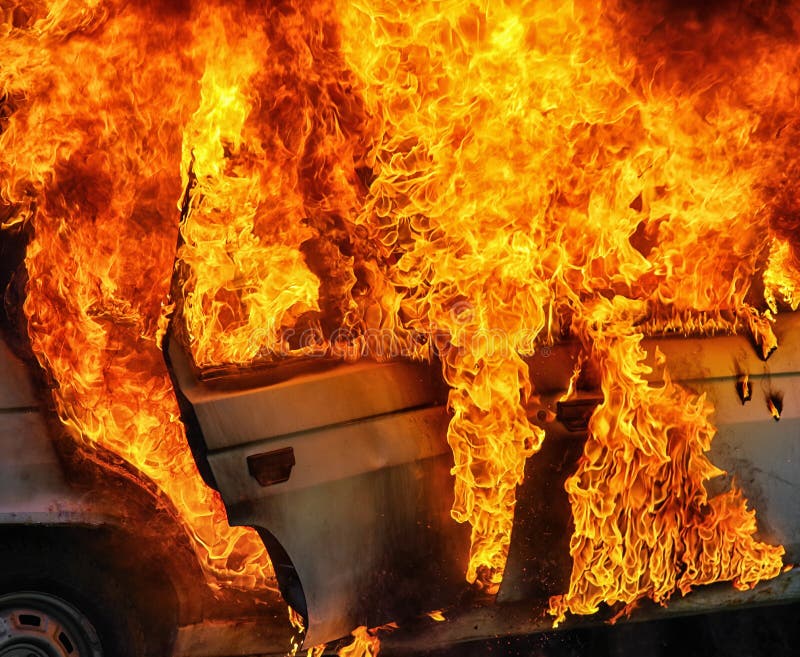 Burning car after accident stock image. Image of orange - 99663197