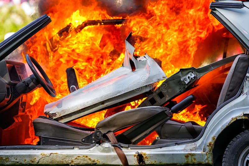 Burning car after accident stock image. Image of fire - 99663223