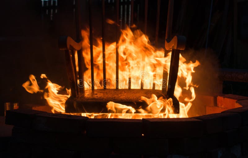 A burning chair stock photo. Image of risk, burning - 187799356