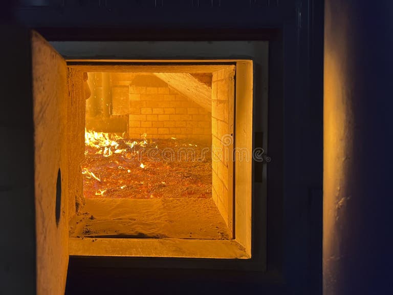Burning Coal and on a Mechanical Grate Visible through the Open Hatch ...