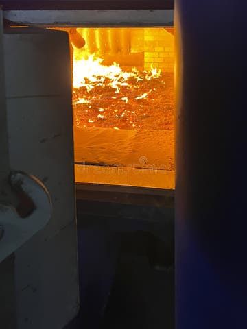 Burning Coal and on a Mechanical Grate Visible through the Open Hatch ...