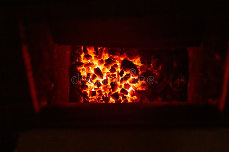 Burning Coals in a Solid Fuel Boiler. Heating of a Residential Building ...